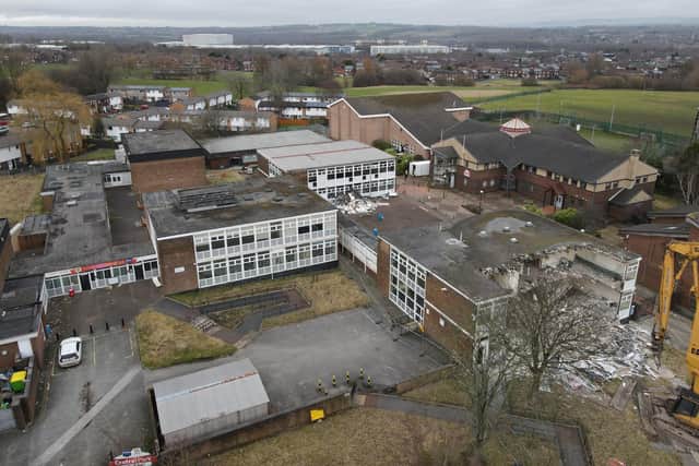 Spectacular bird's-eye view of a Wigan school's demolition Spectacular bird's-eye view of a Wigan school's demolition